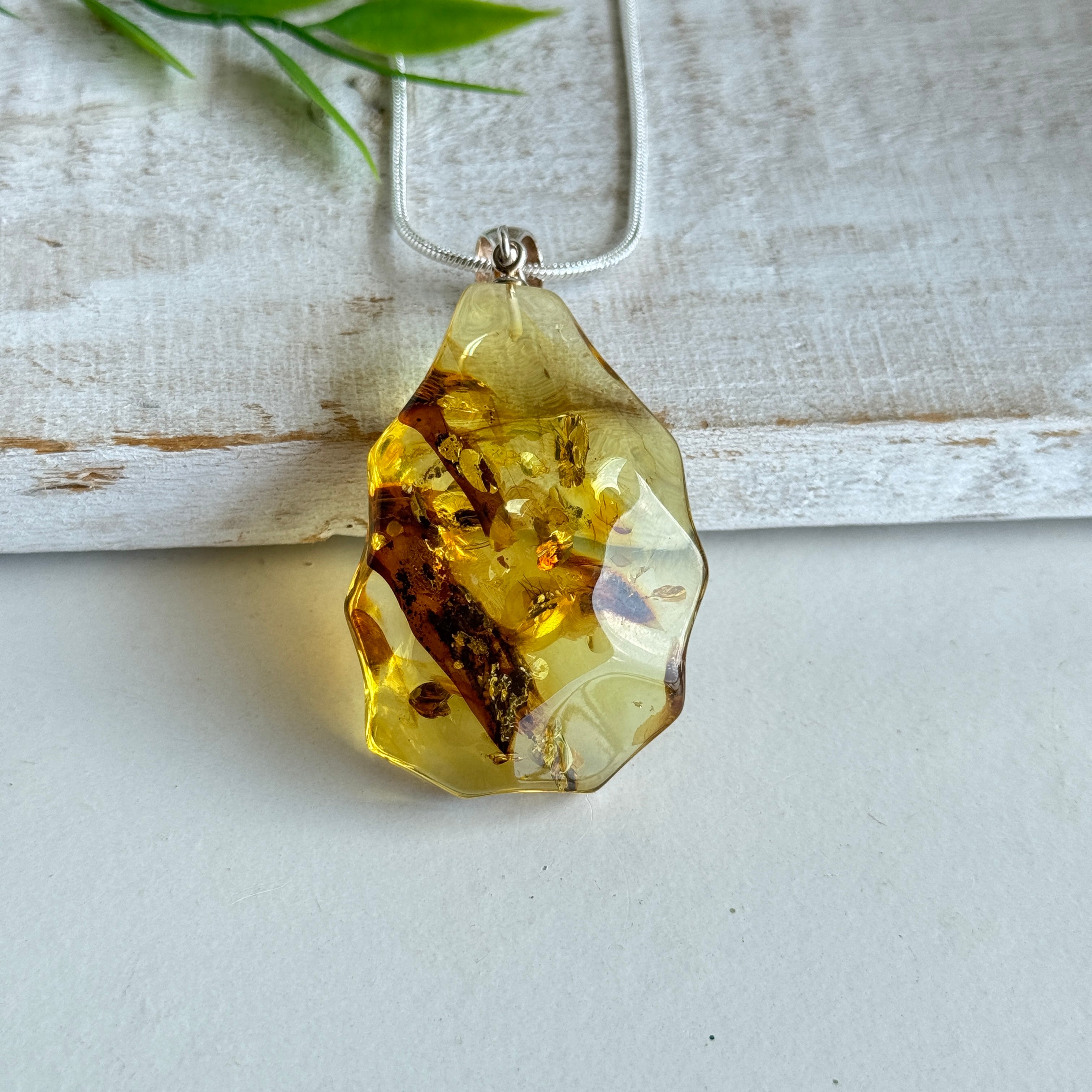 Amber Freeform Pendant With Insect – Preah Ko Maitland